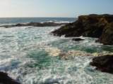 DSC01144 red rocks near ocean.JPG